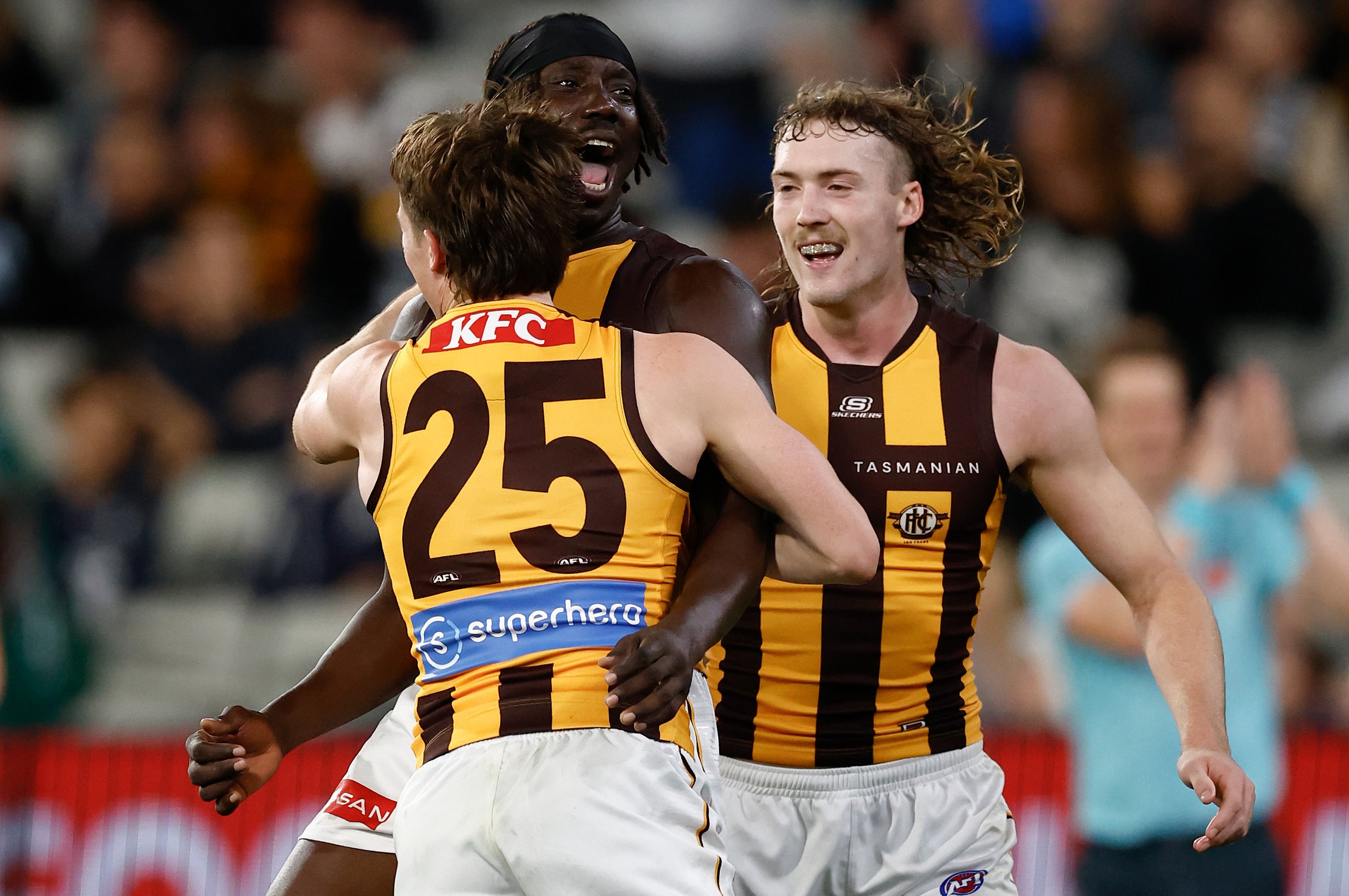 Hawks battle past Blues to soar to 3-0 start