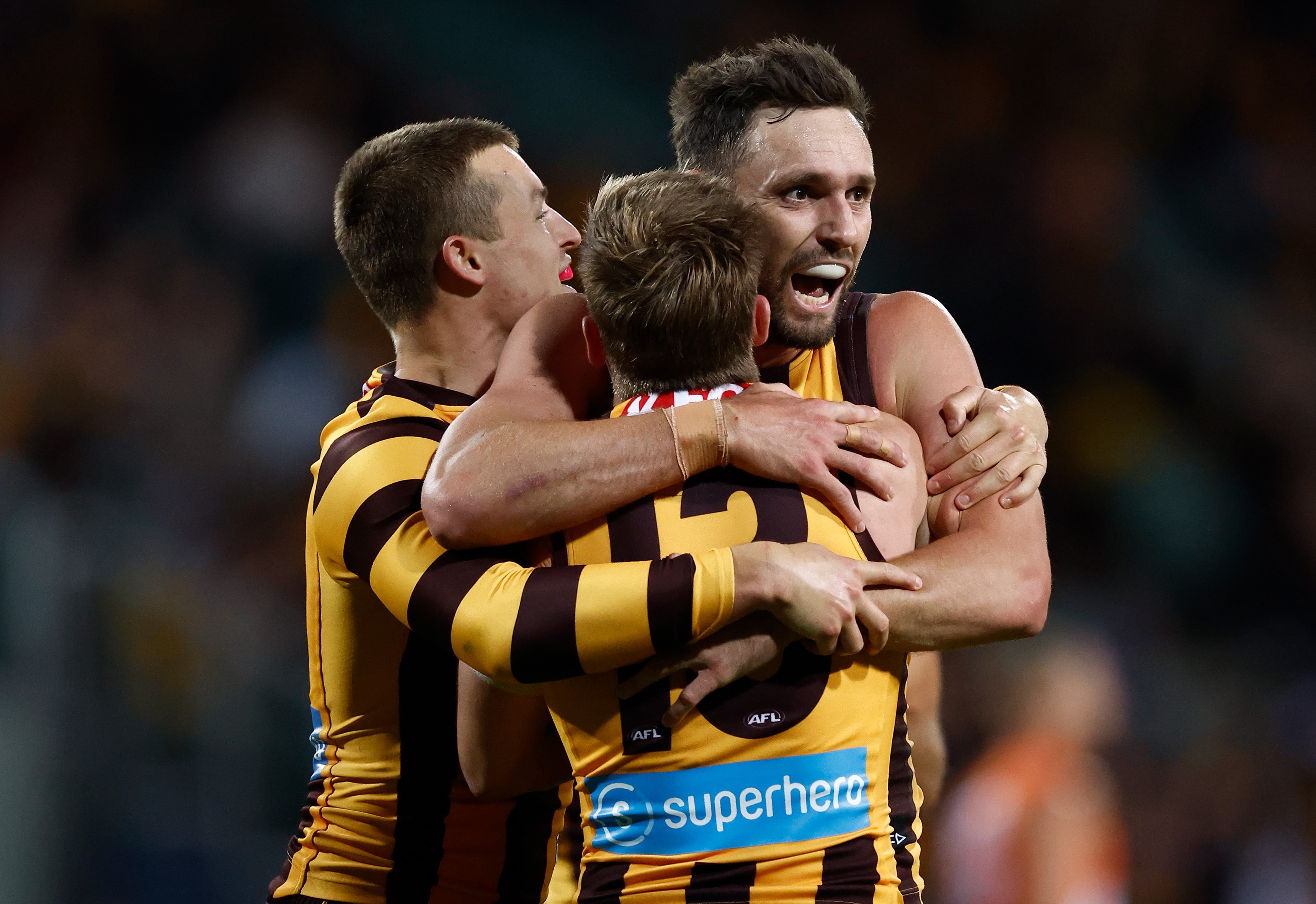 Hawks edge Giants in windy Tassie to stay unbeaten