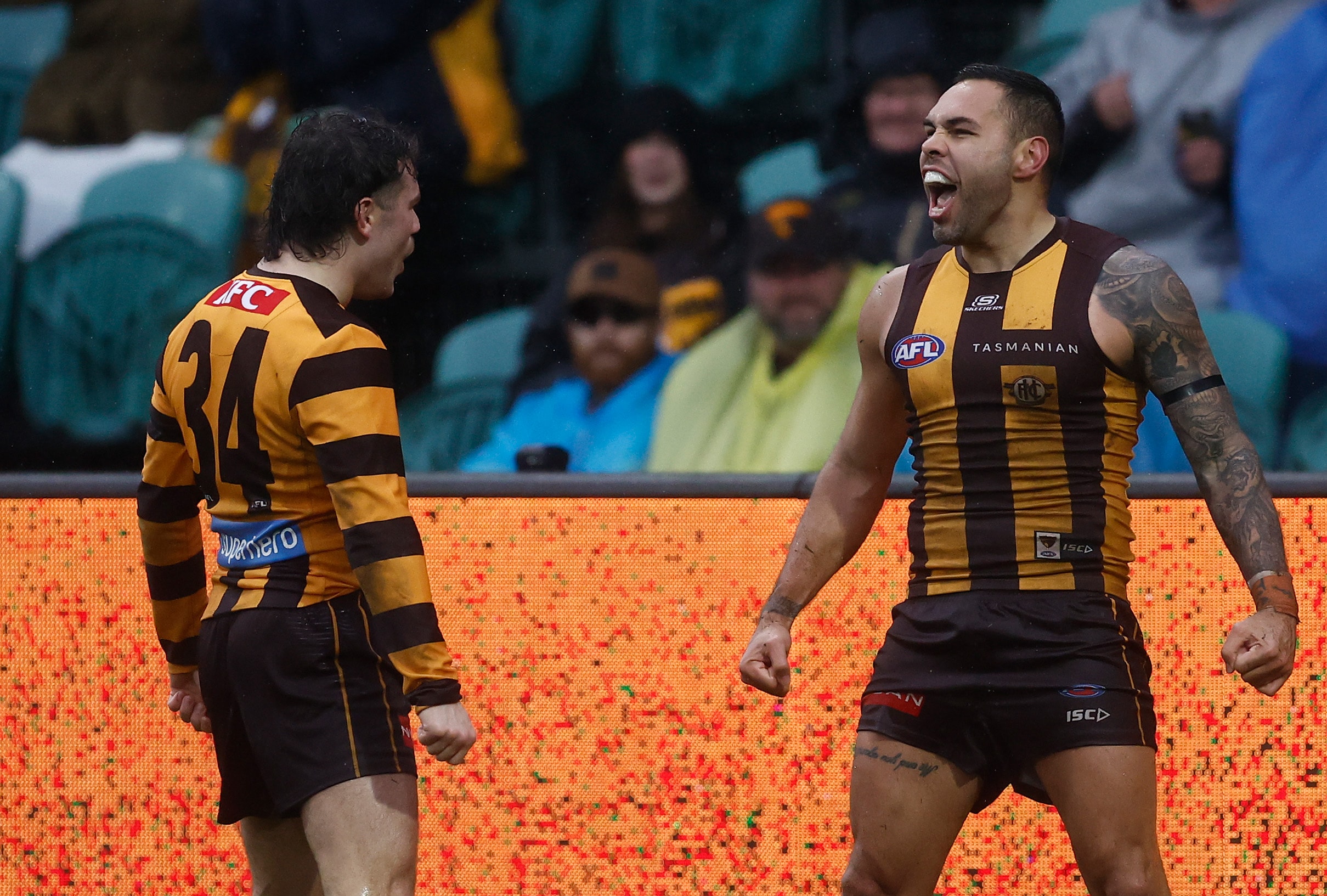 Hawks outlast Power in wet and wild Tassie scrap